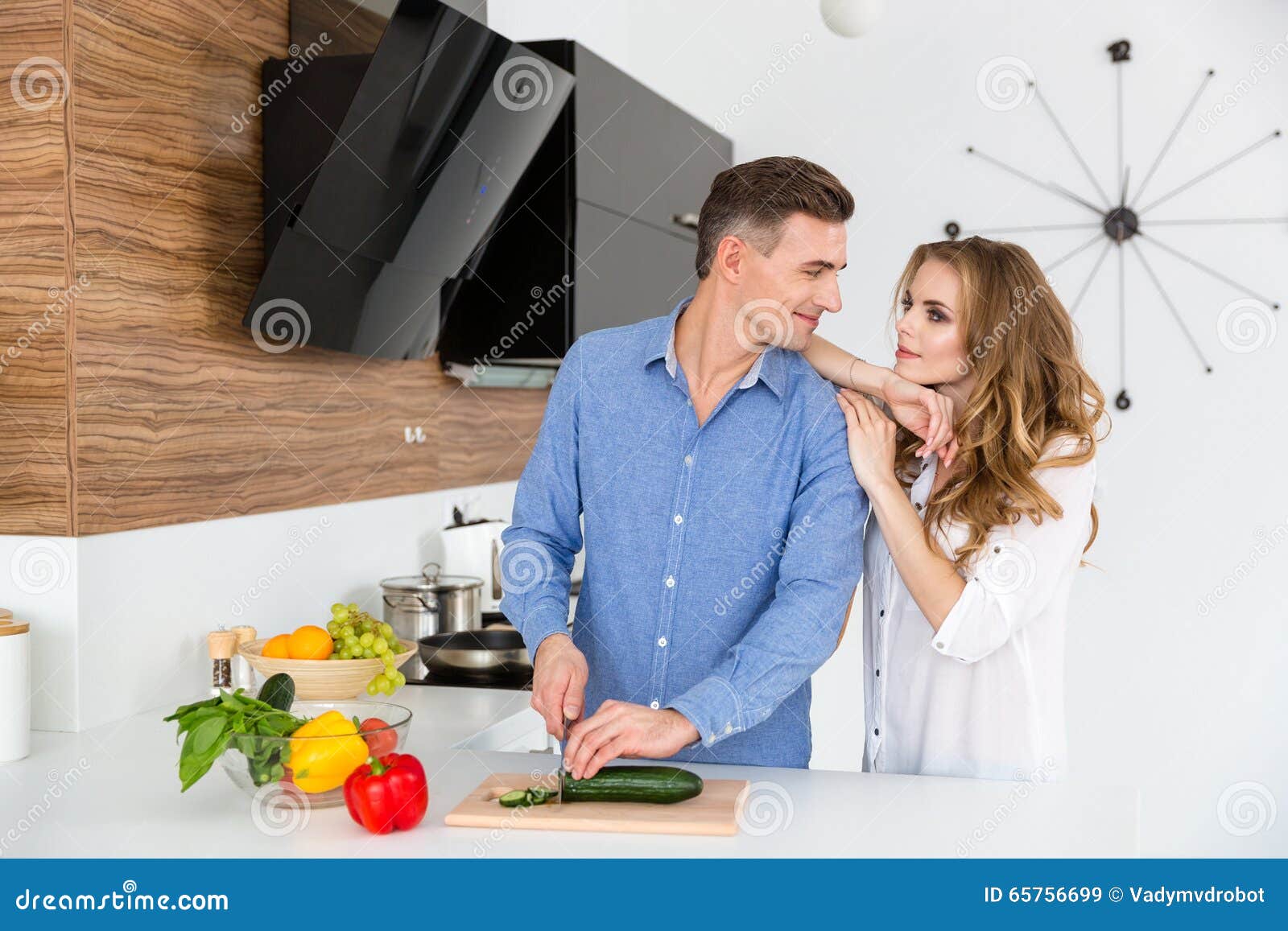 Beautiful Couple Cutting Vegetables on the Kitchen Stock Image - Image ...
