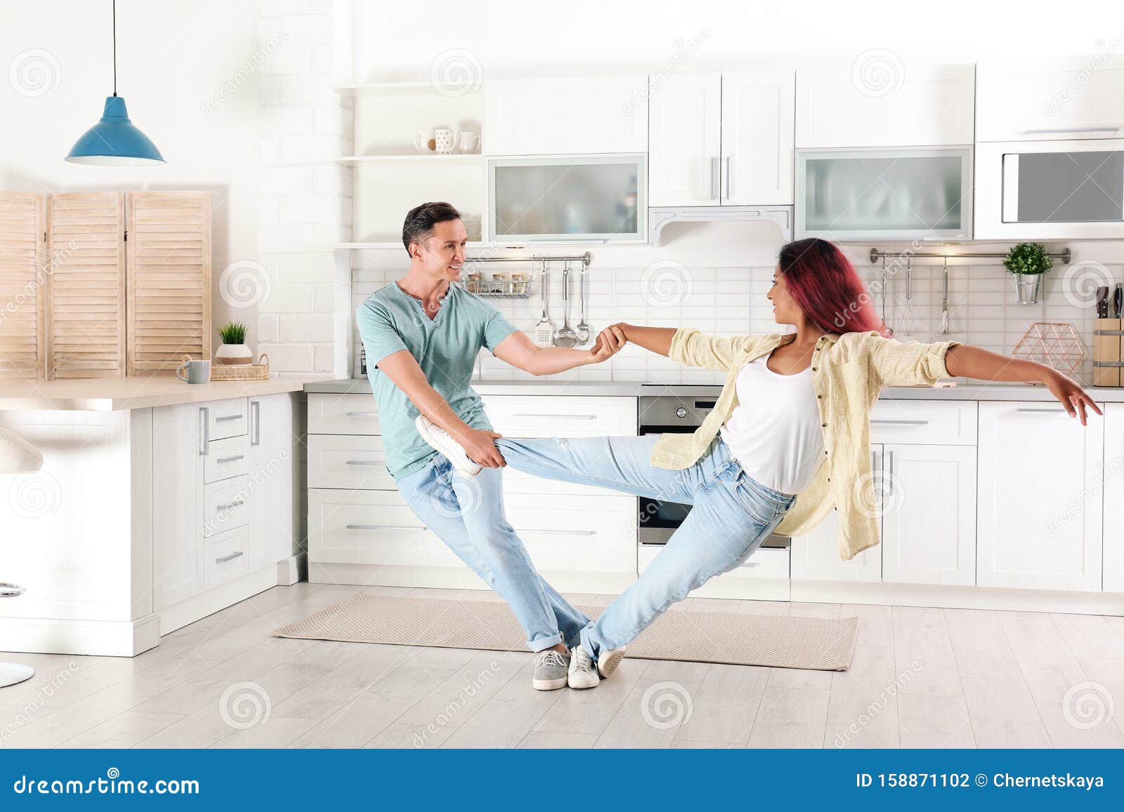 Beautiful Couple Dancing in Kitchen Stock Photo - Image of dancer ...