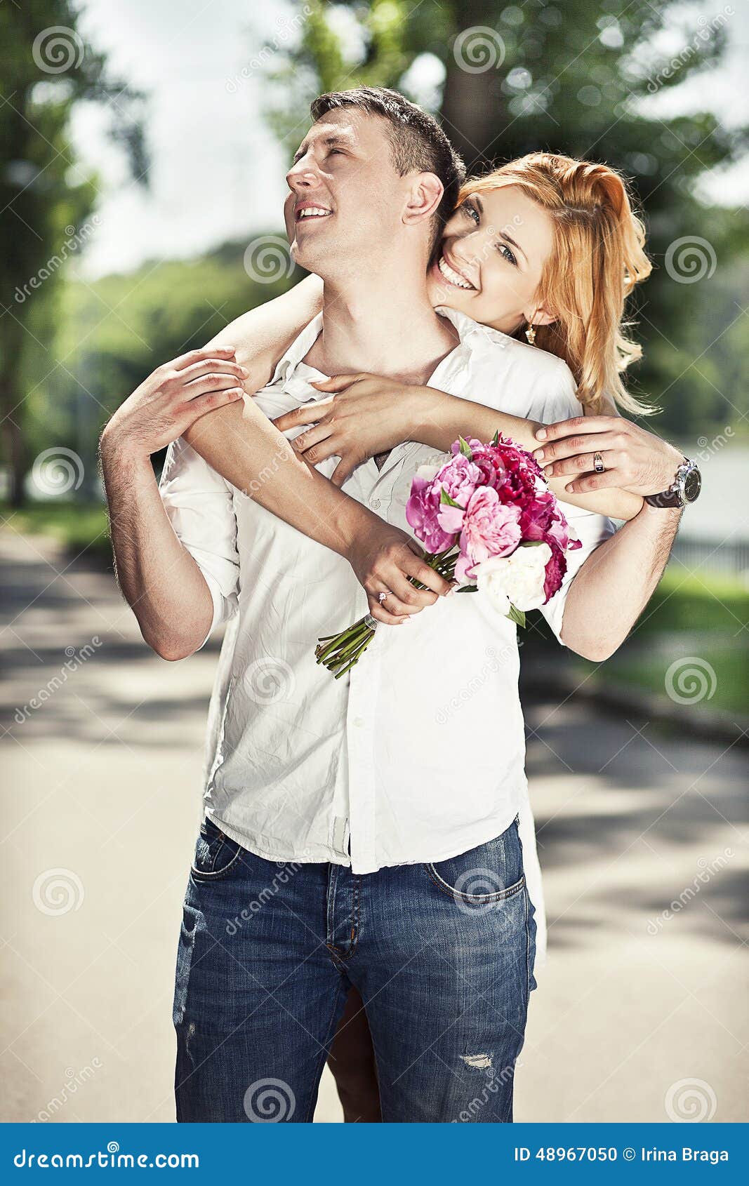 Beautiful Couple Embrace in the Park Stock Photo - Image of heart ...