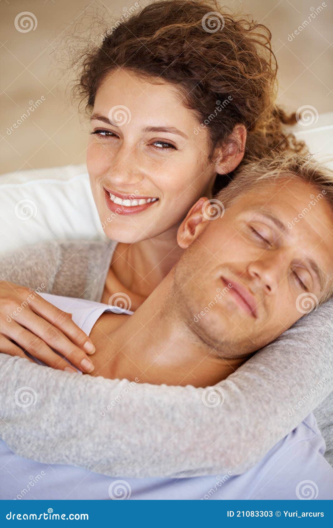 Beautiful couple embracing stock image. Image of home - 21083303
