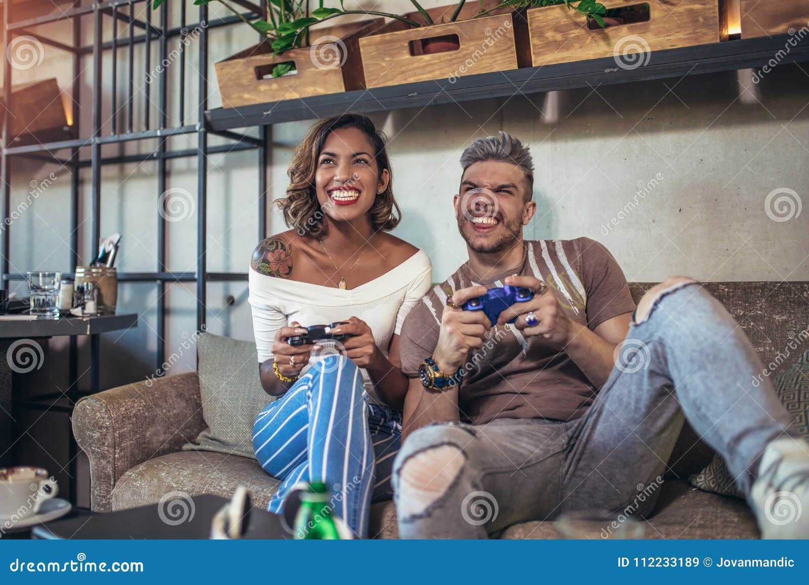 Couple Having Fun while Playing Video Games. Stock Image - Image of ...