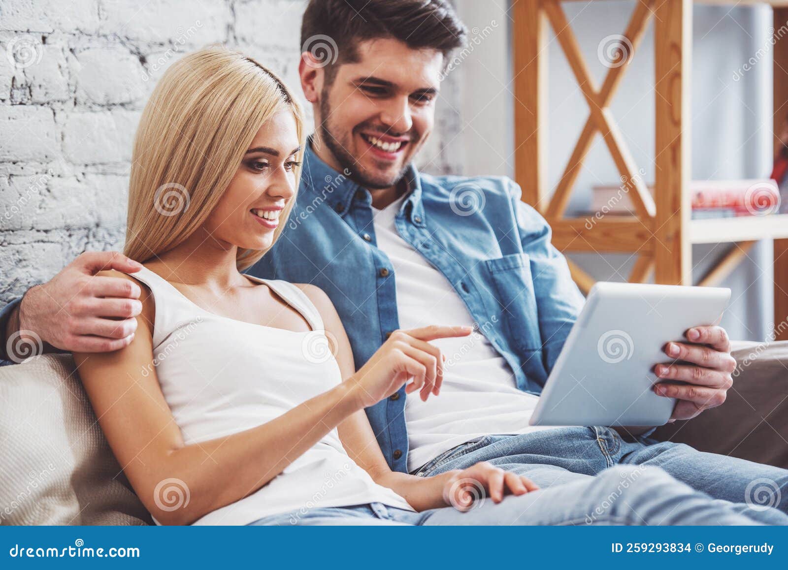 Beautiful Couple at Home with Gadget Stock Photo - Image of boyfriend ...
