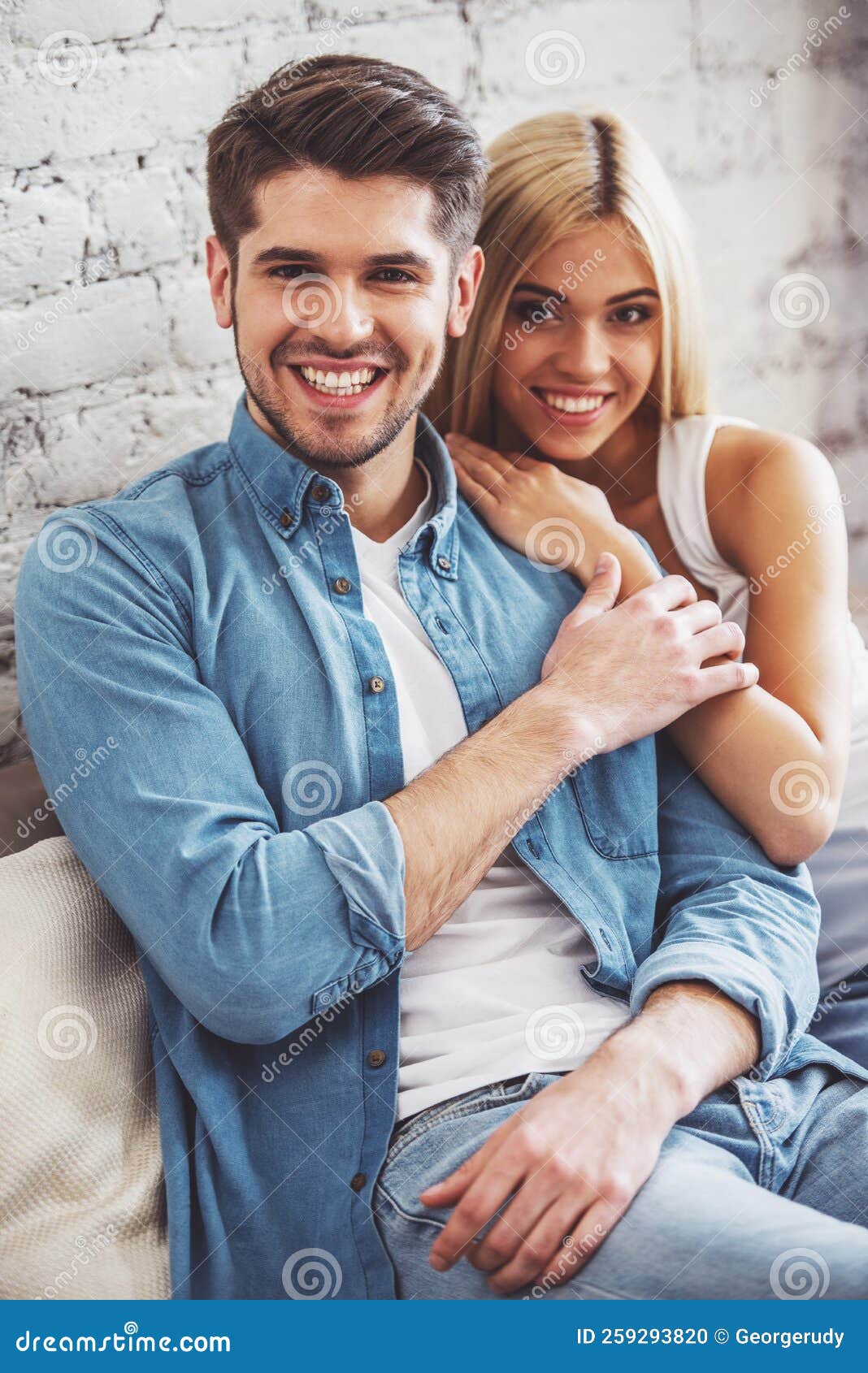 Beautiful couple at home stock photo. Image of harmony - 259293820