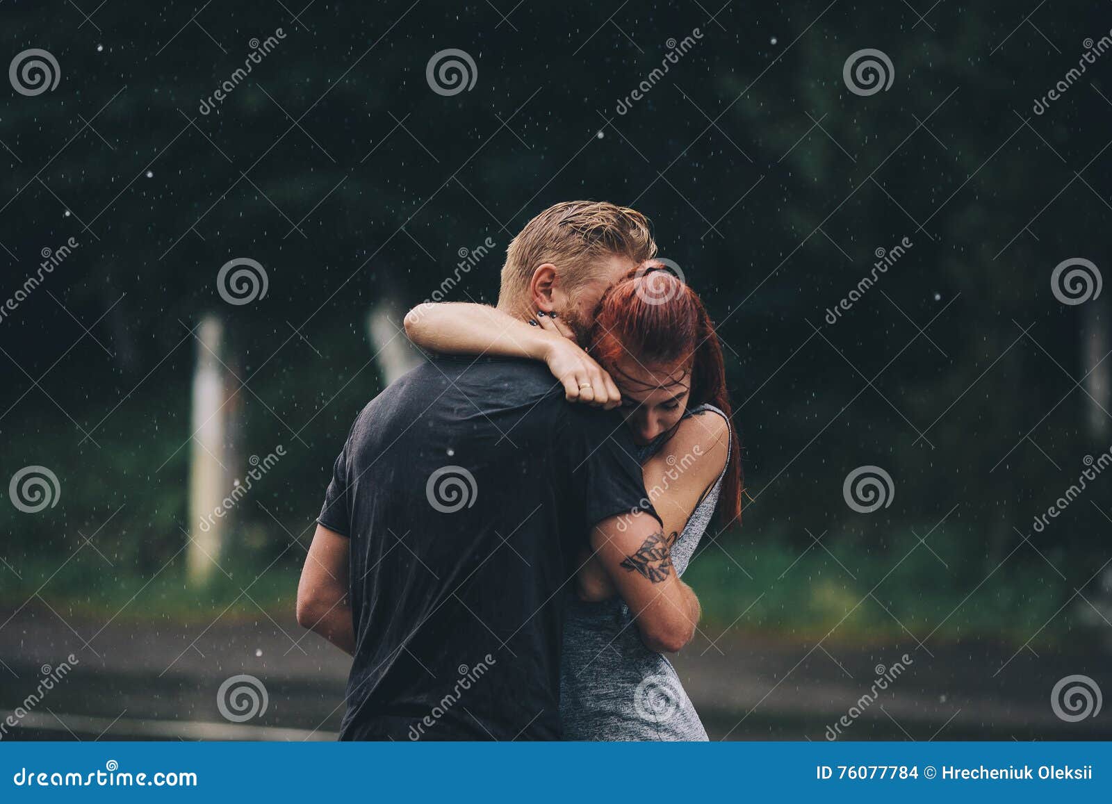 Couple Hug In Rain