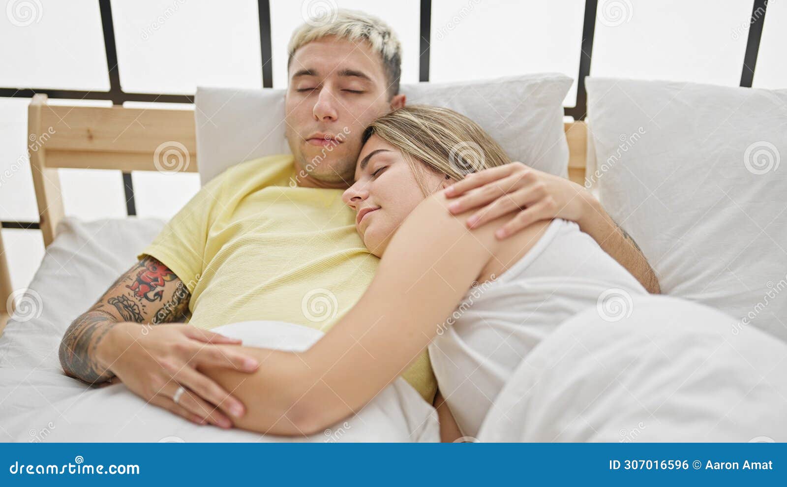 Beautiful Couple Lying on Bed Hugging Each Other Sleeping at Bedroom ...