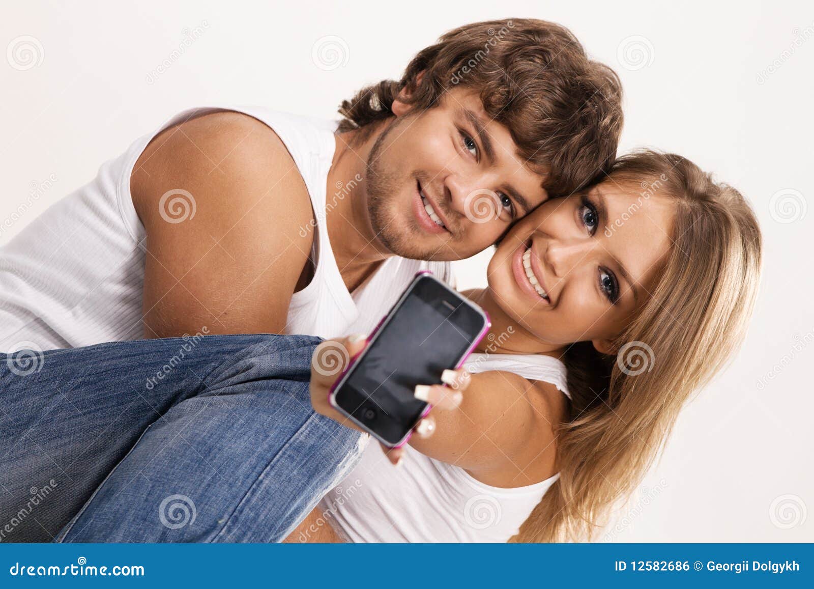 Beautiful Couple with a Mobile Phone Stock Photo - Image of love ...