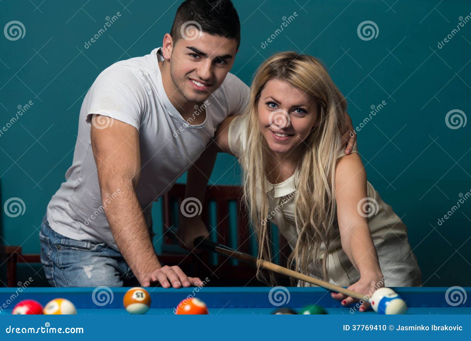 Beautiful Couple Playing Pool Stock Photo - Image of couple, clubbing ...