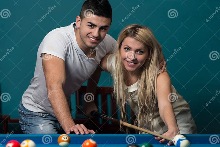 Beautiful Couple Playing Pool Stock Photo - Image of couple, clubbing ...