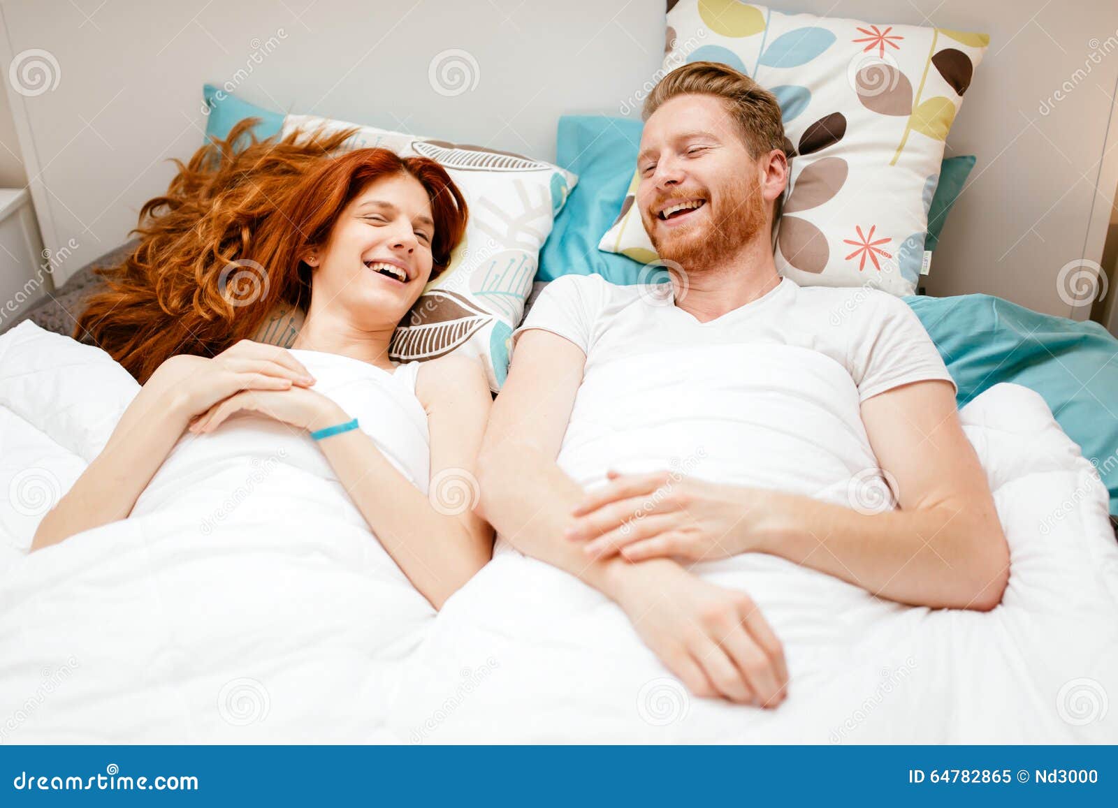 Beautiful Couple Smiling in Bed Stock Image - Image of lying, beautiful ...