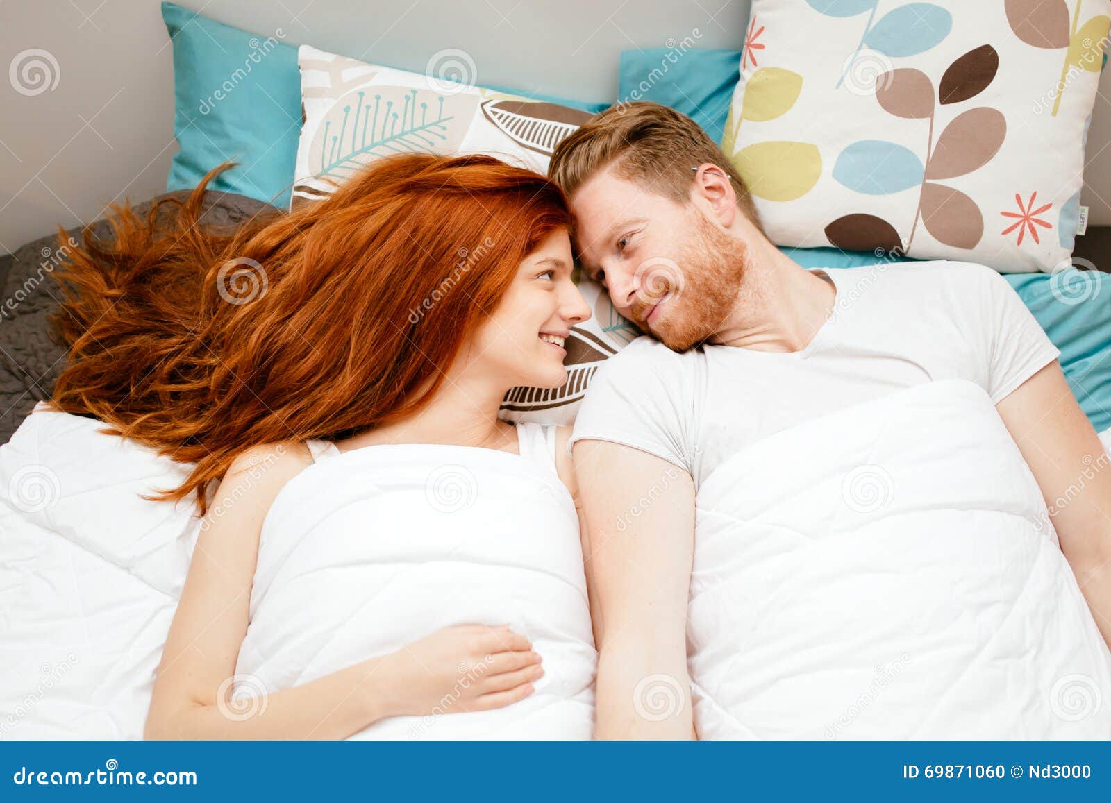 Beautiful Couple Smiling in Bed Stock Photo - Image of bedroom, girl ...