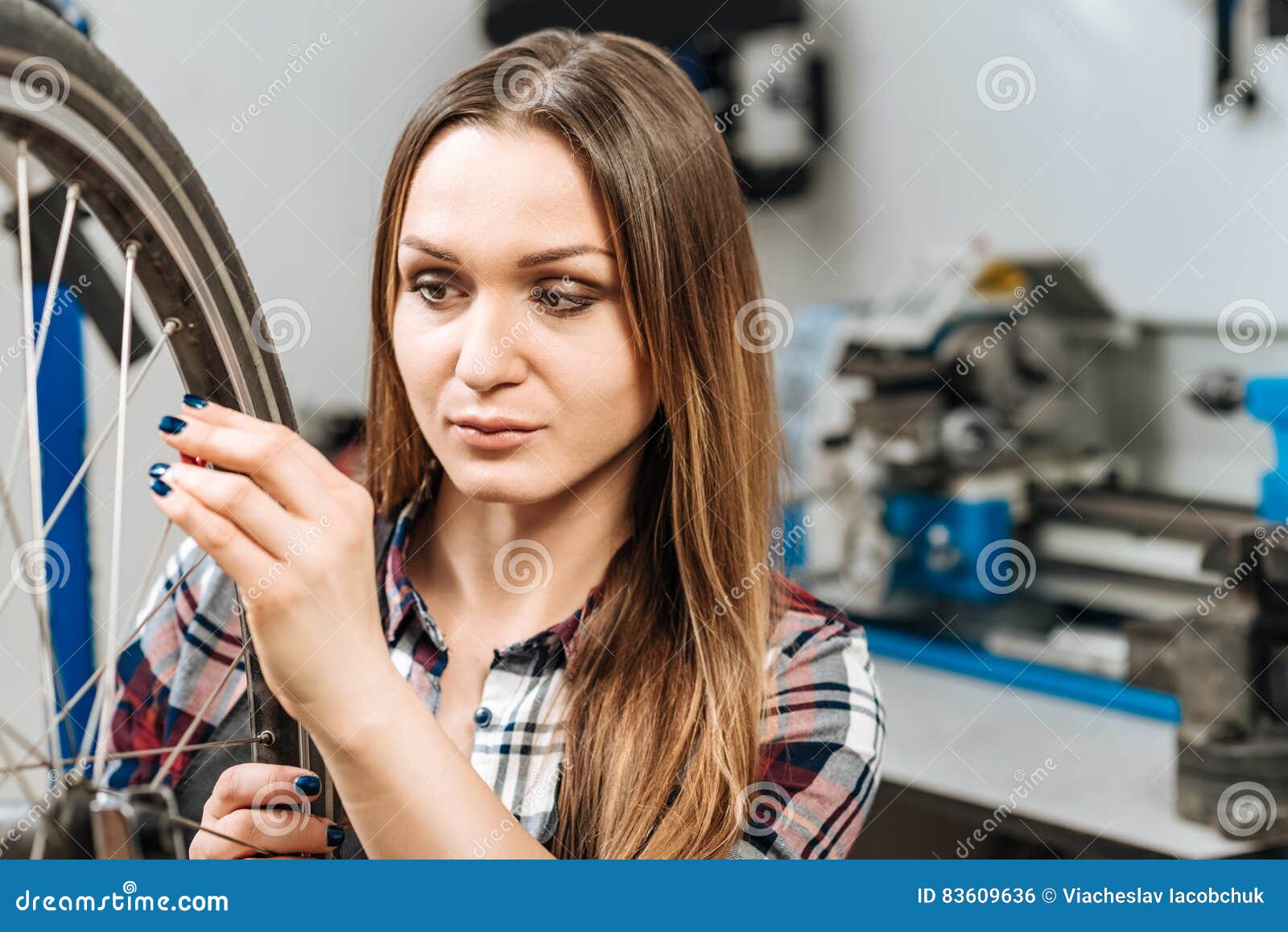 Beautiful Craftswoman Pumping the Wheel in the Workshop Stock Photo ...