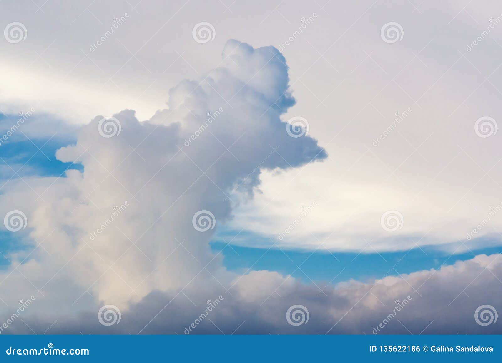 Beautiful Cumulus Clouds of Unusual Shape in the Blue Sky on a Summer ...