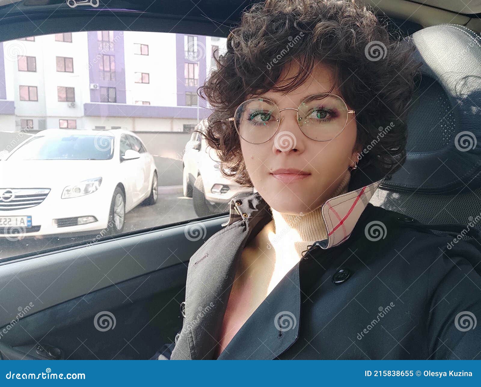 Beautiful Curly Girl Listening To Music On Headphones Stock Image