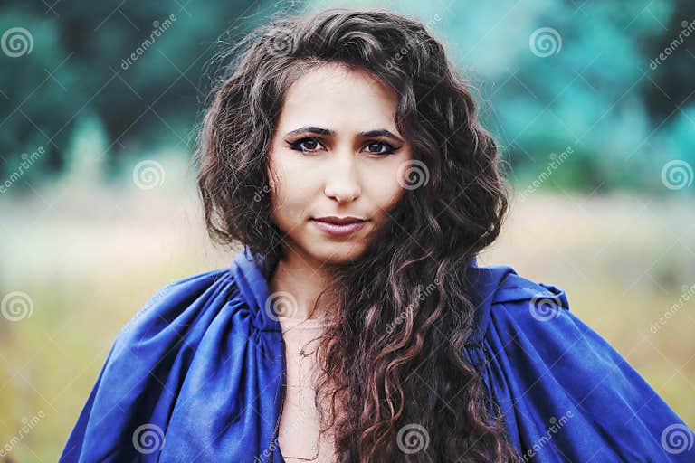 Beautiful Curly-haired Witch Stock Image - Image of black, attractive ...