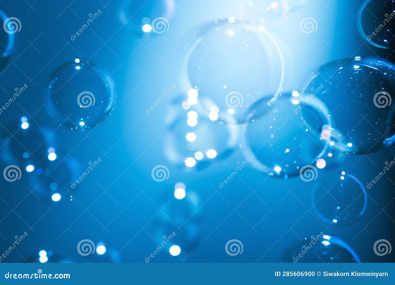 Beautiful Dark Blue Soap Bubbles Floating and Rays of Light. Abstract ...
