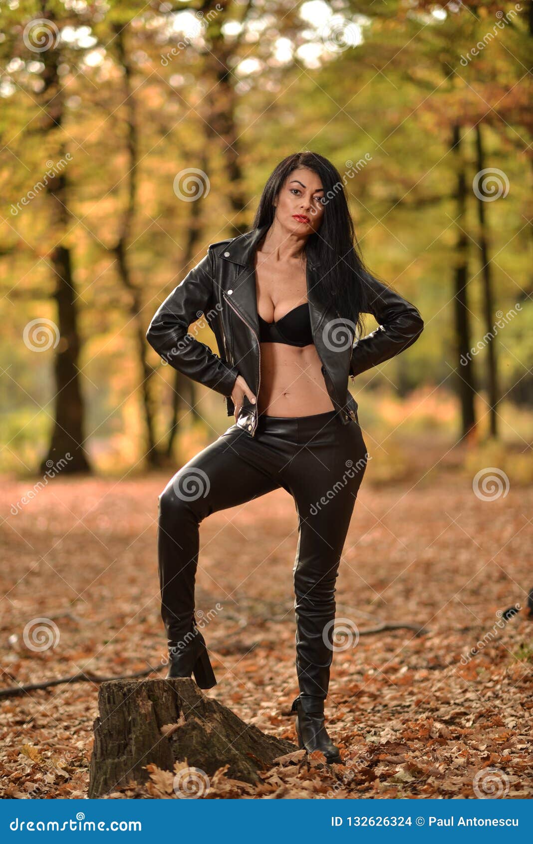 Beautiful Dark Haired Young Woman Wearing A Black Bra Leather Jacket