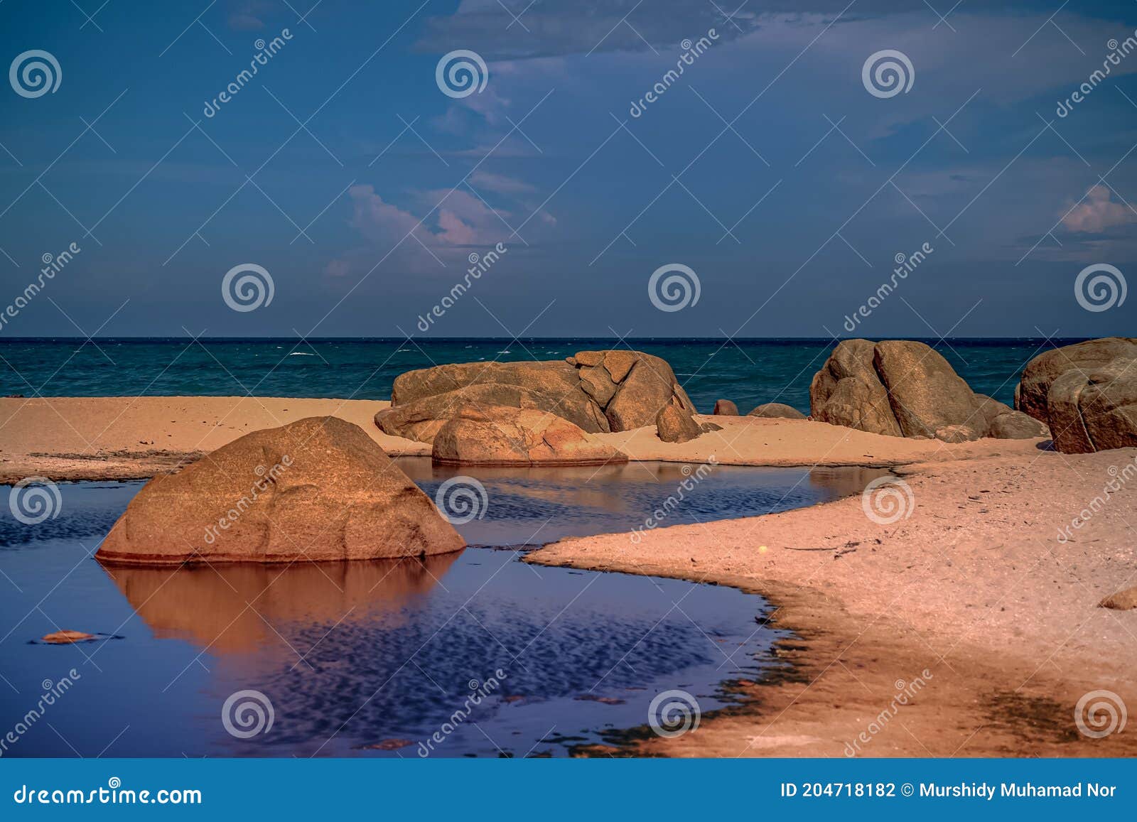 Beautiful day at the beach stock photo. Image of water - 204718182