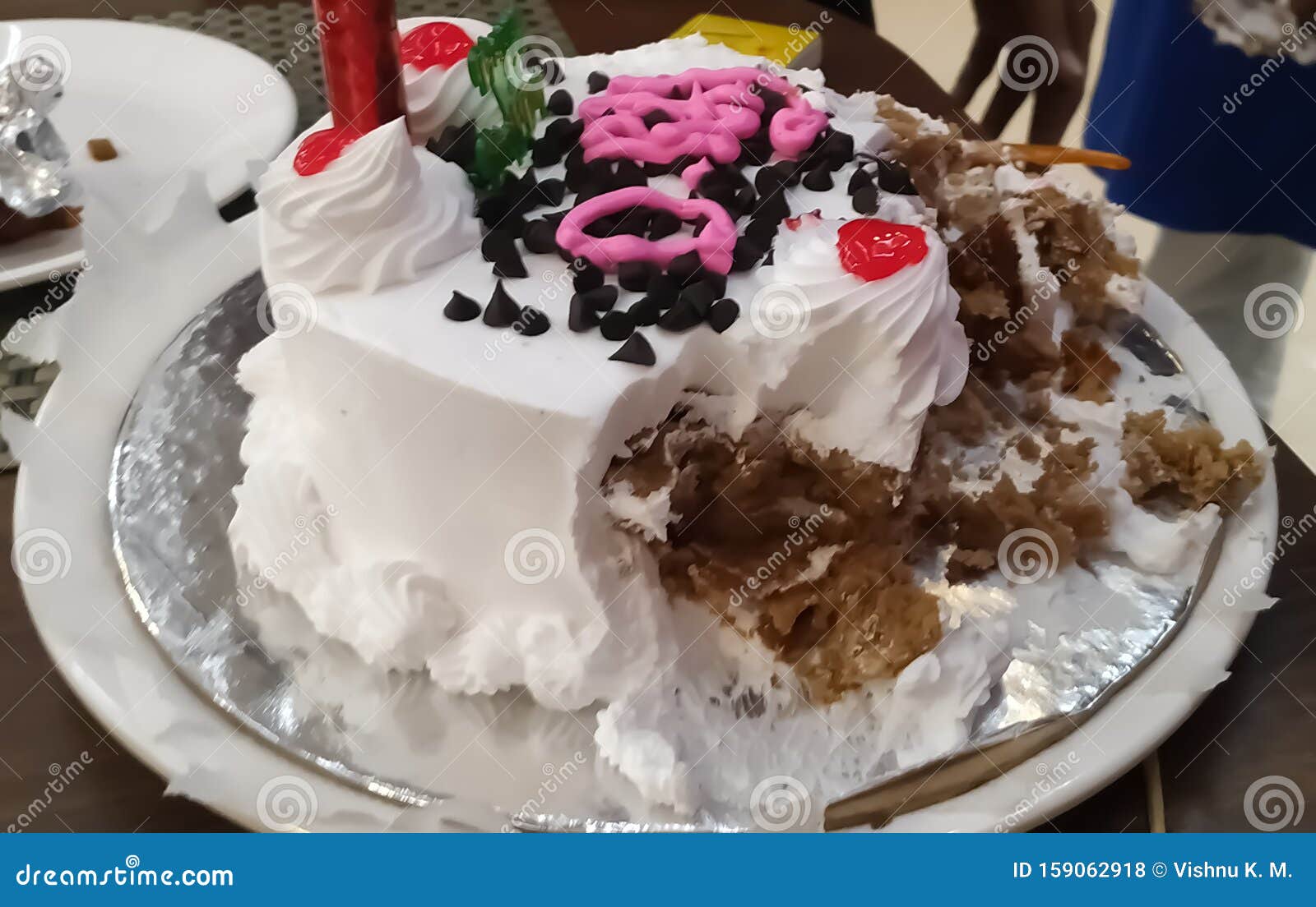 A Beautiful Decorated Cake, a Slice of Delicious Cake. Stock Photo ...