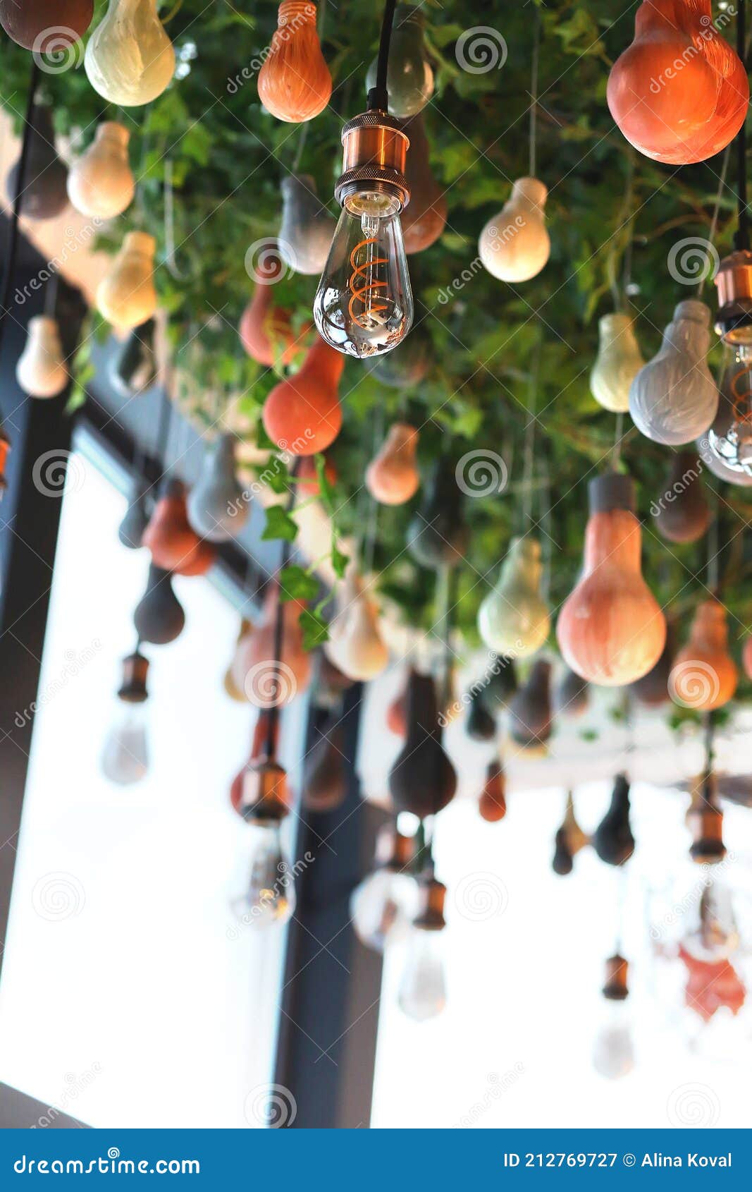 A Beautiful Decorative Tree is Decorated with Many Light Bulbs ...