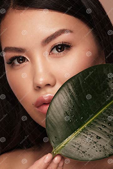 Beautiful Delicate Woman With Nude Makeup And Perfect Skin Beauty Face