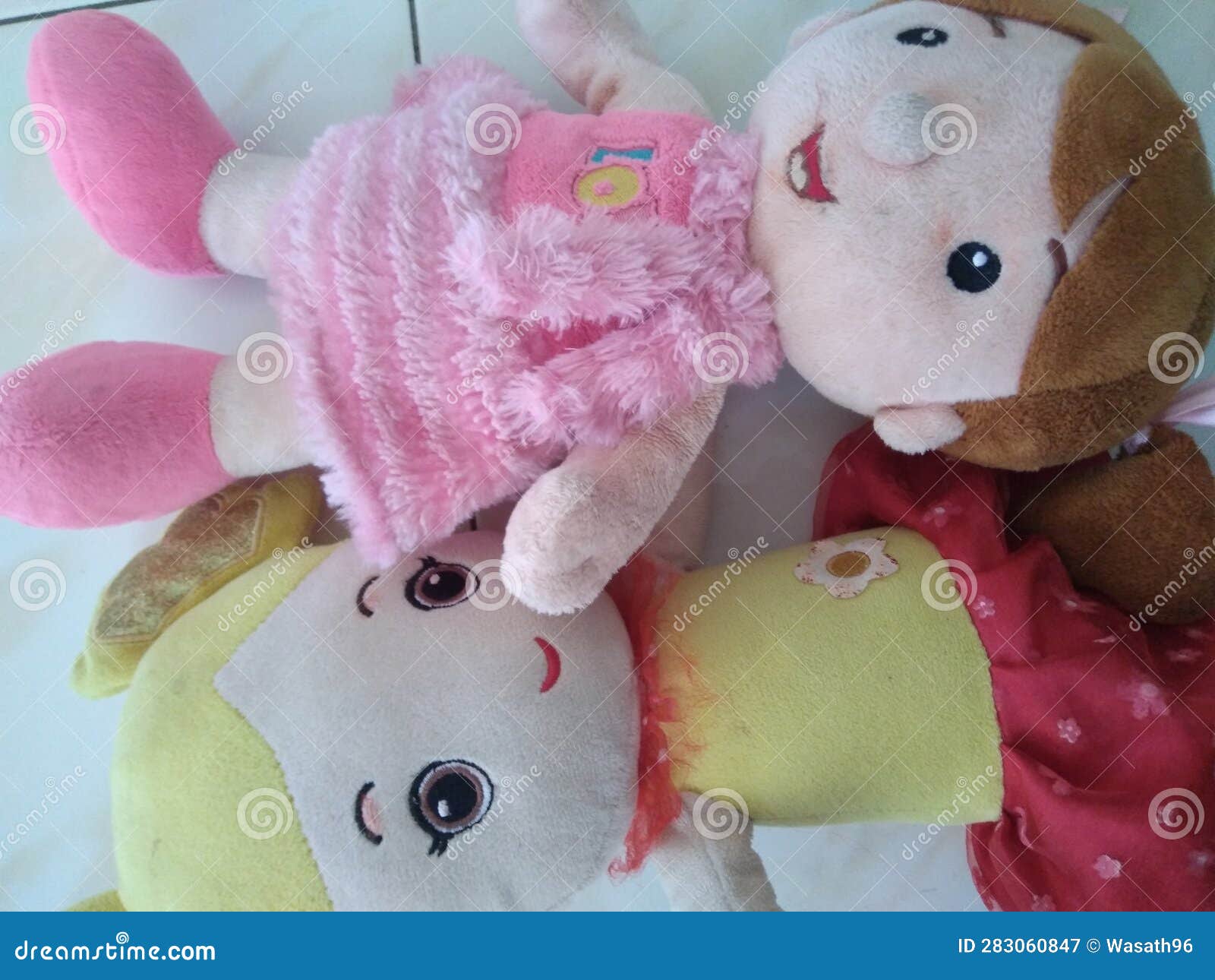 Beautiful Dolls Lying Side by Side Stock Image - Image of figurine ...