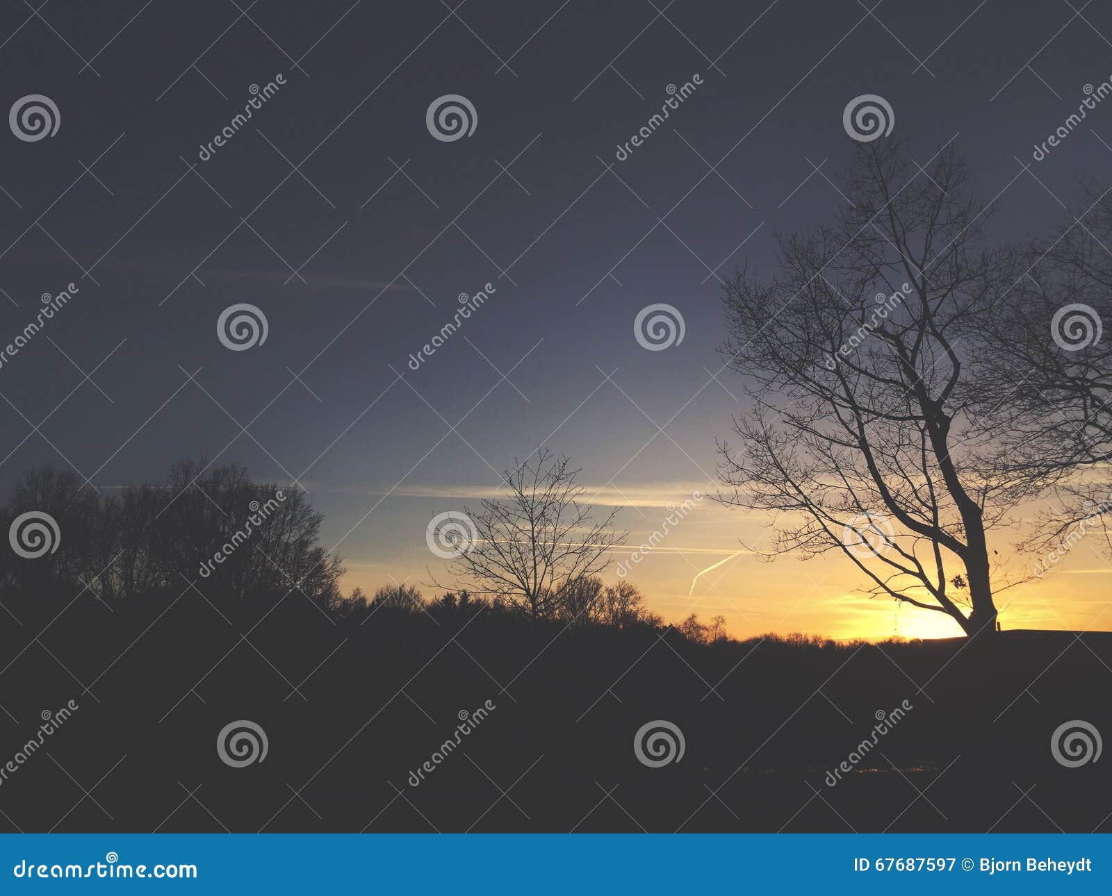 Beautiful Dramatic Sunset Over a Field Stock Image - Image of dark ...