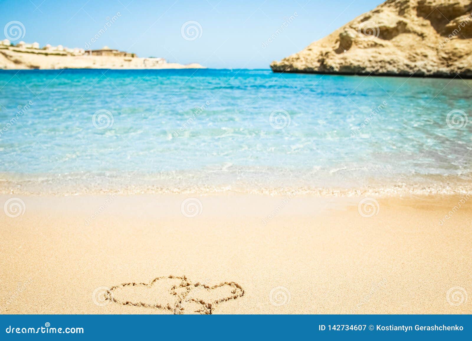 Beautiful Drawing on the Sand of the Sea Background Stock Image - Image ...