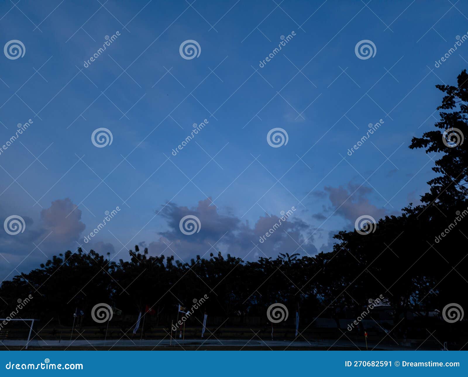 The Beautiful Evening Sky is Orange and the Clouds are Getting Dark ...