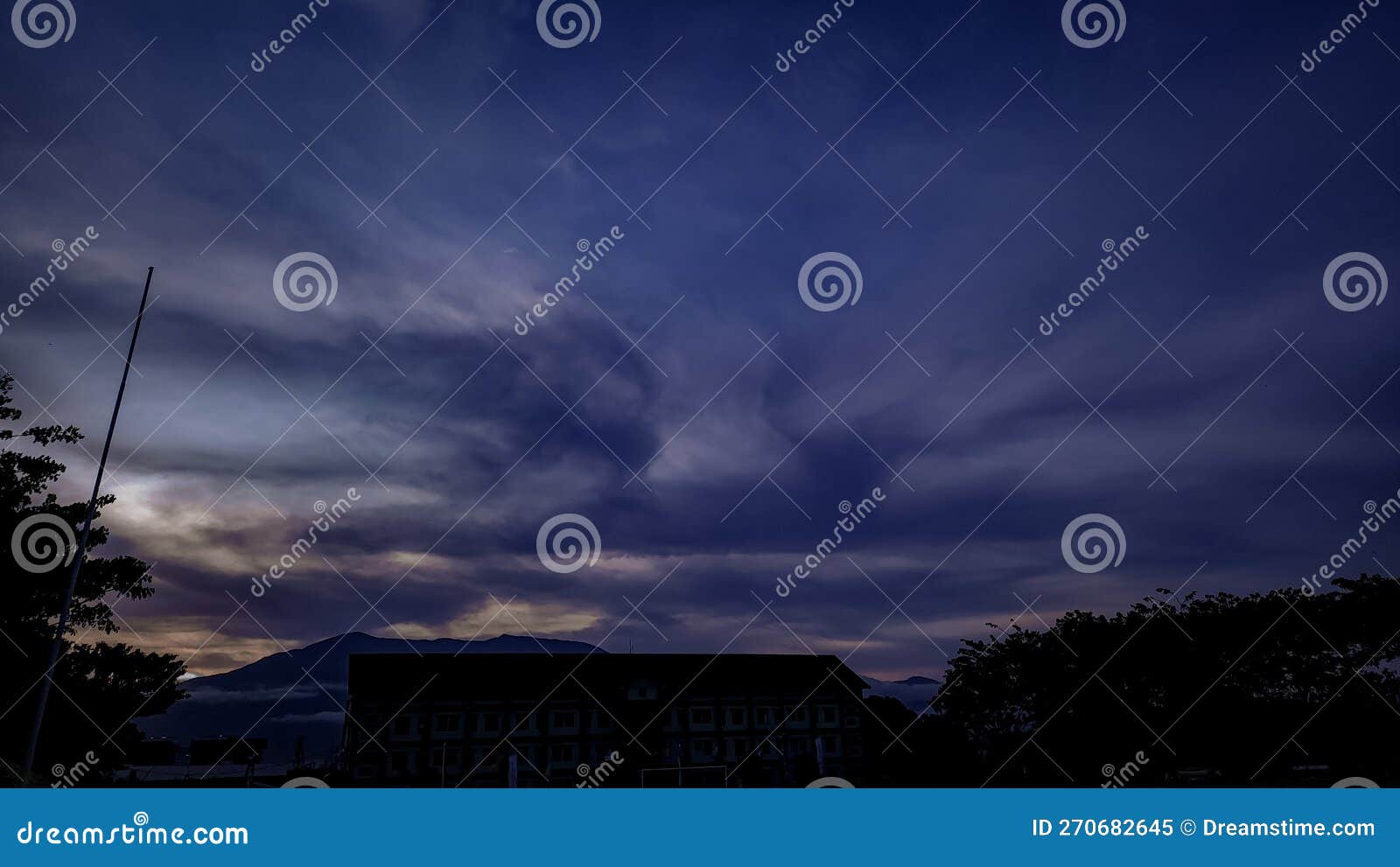 The Beautiful Evening Sky is Orange and the Clouds are Getting Dark ...