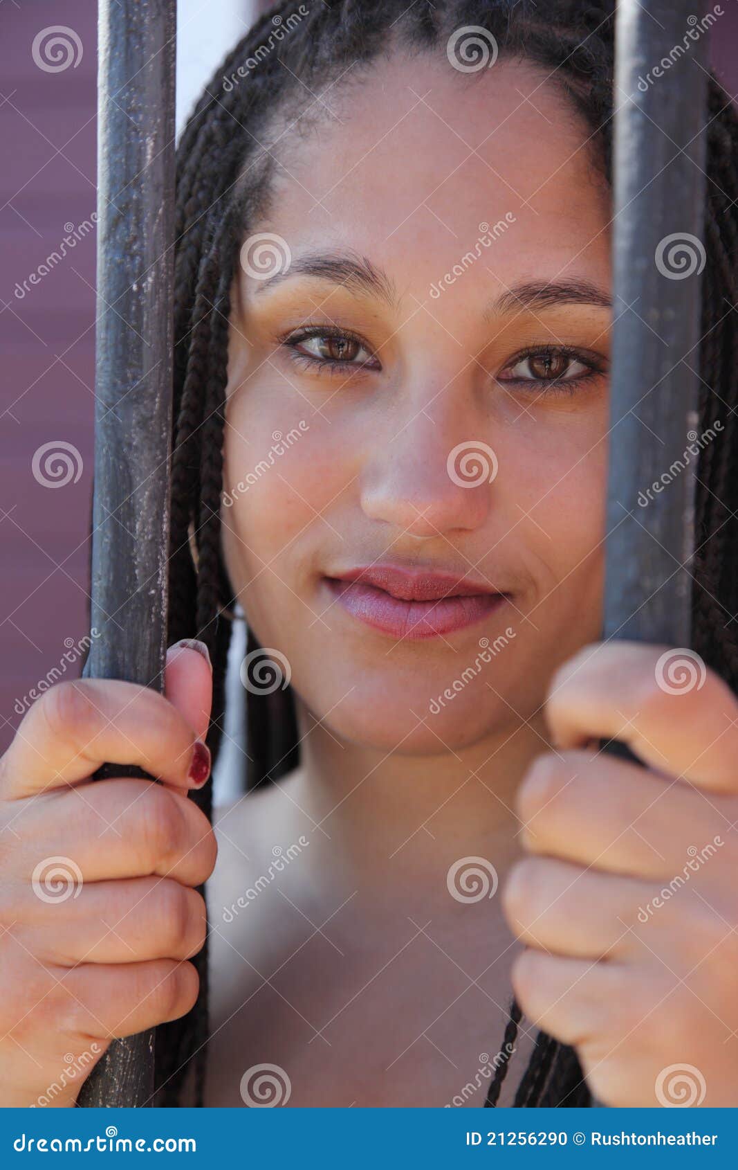 Beautiful face behind bars stock photo. Image of emotion - 21256290