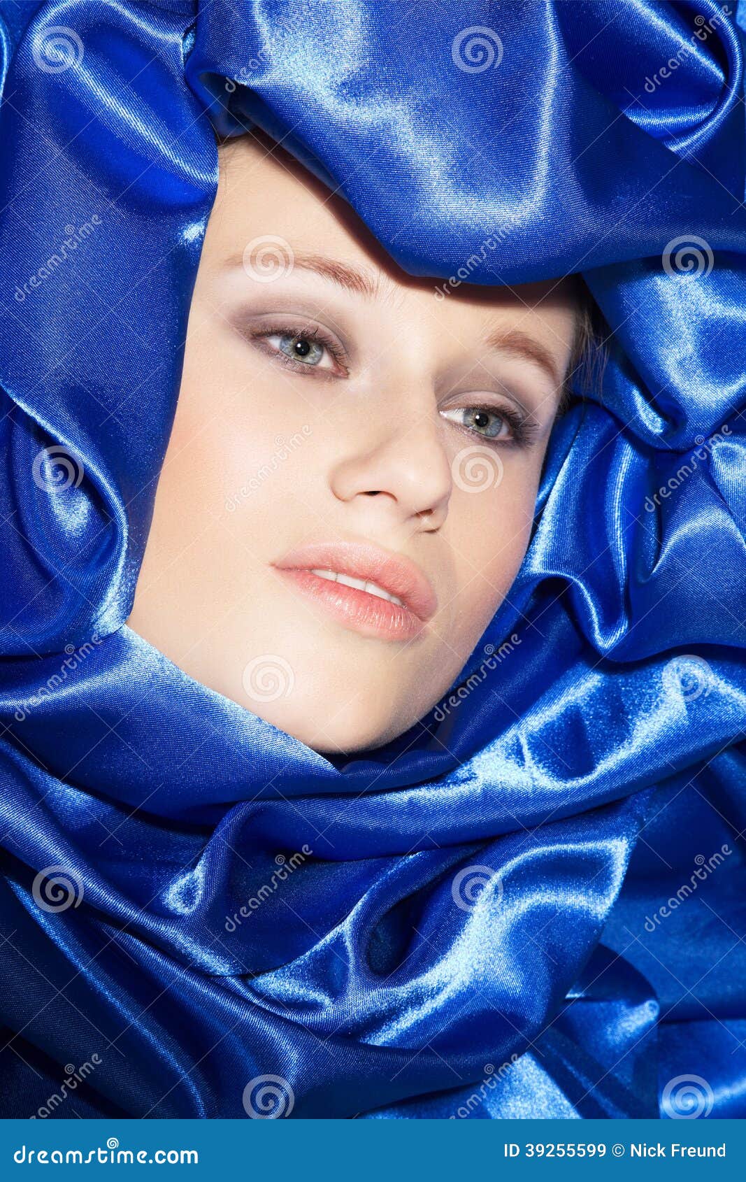 Beautiful face in satin stock image. Image of people - 39255599
