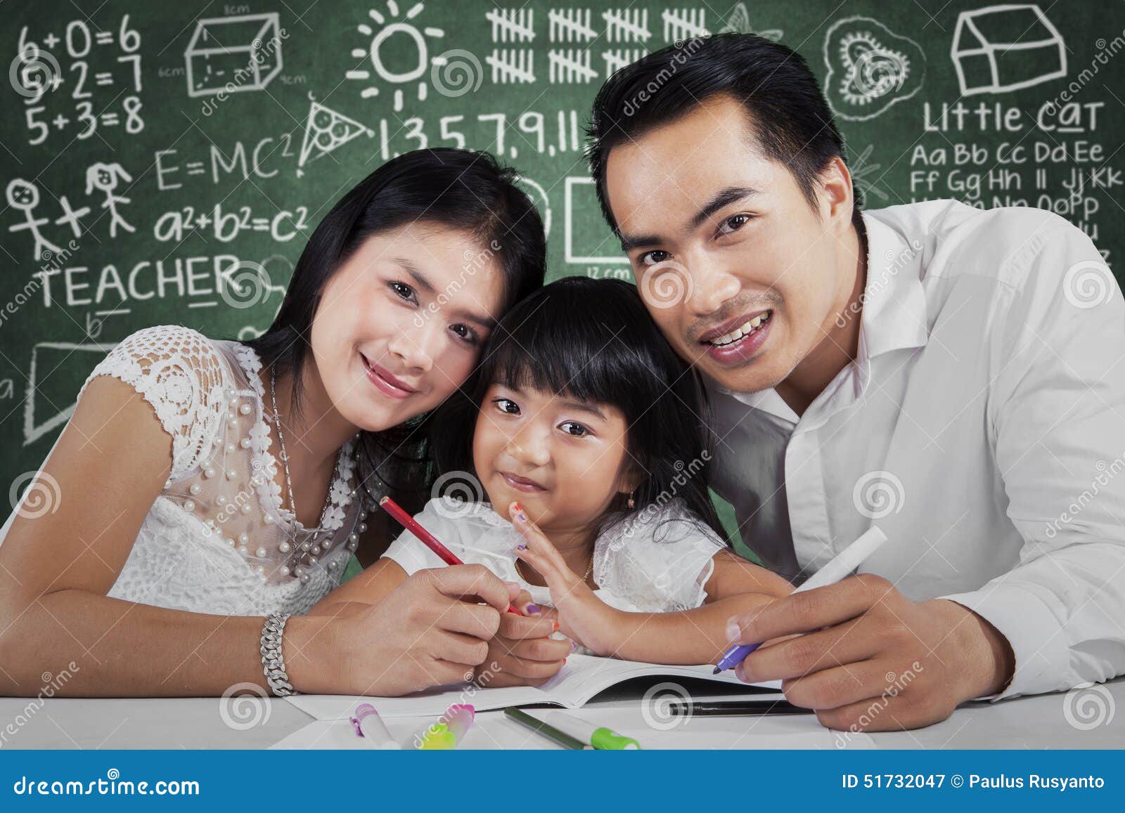 Beautiful Family Doing Schoolwork Stock Image - Image of family ...