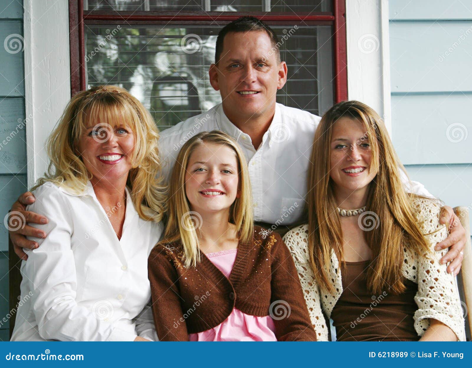 Beautiful Family on Front Porch Stock Image - Image of adult, group ...