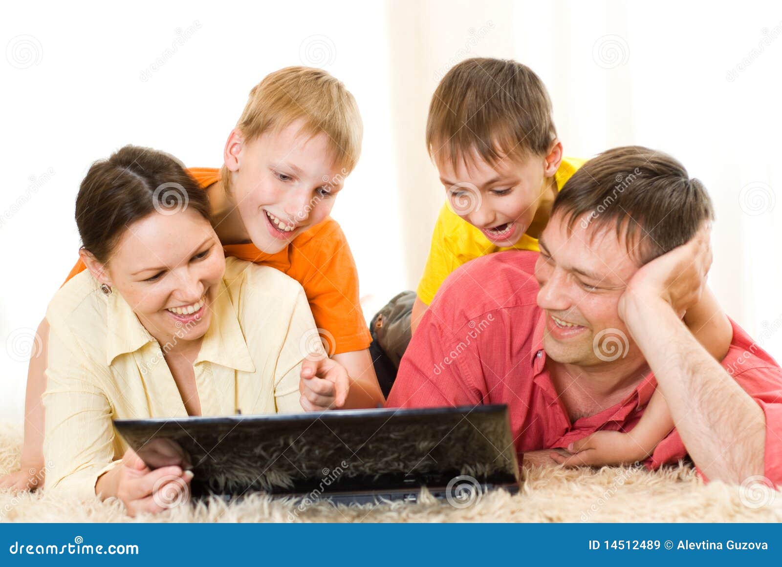 Beautiful Family with a Laptop Stock Image - Image of family, laptop ...
