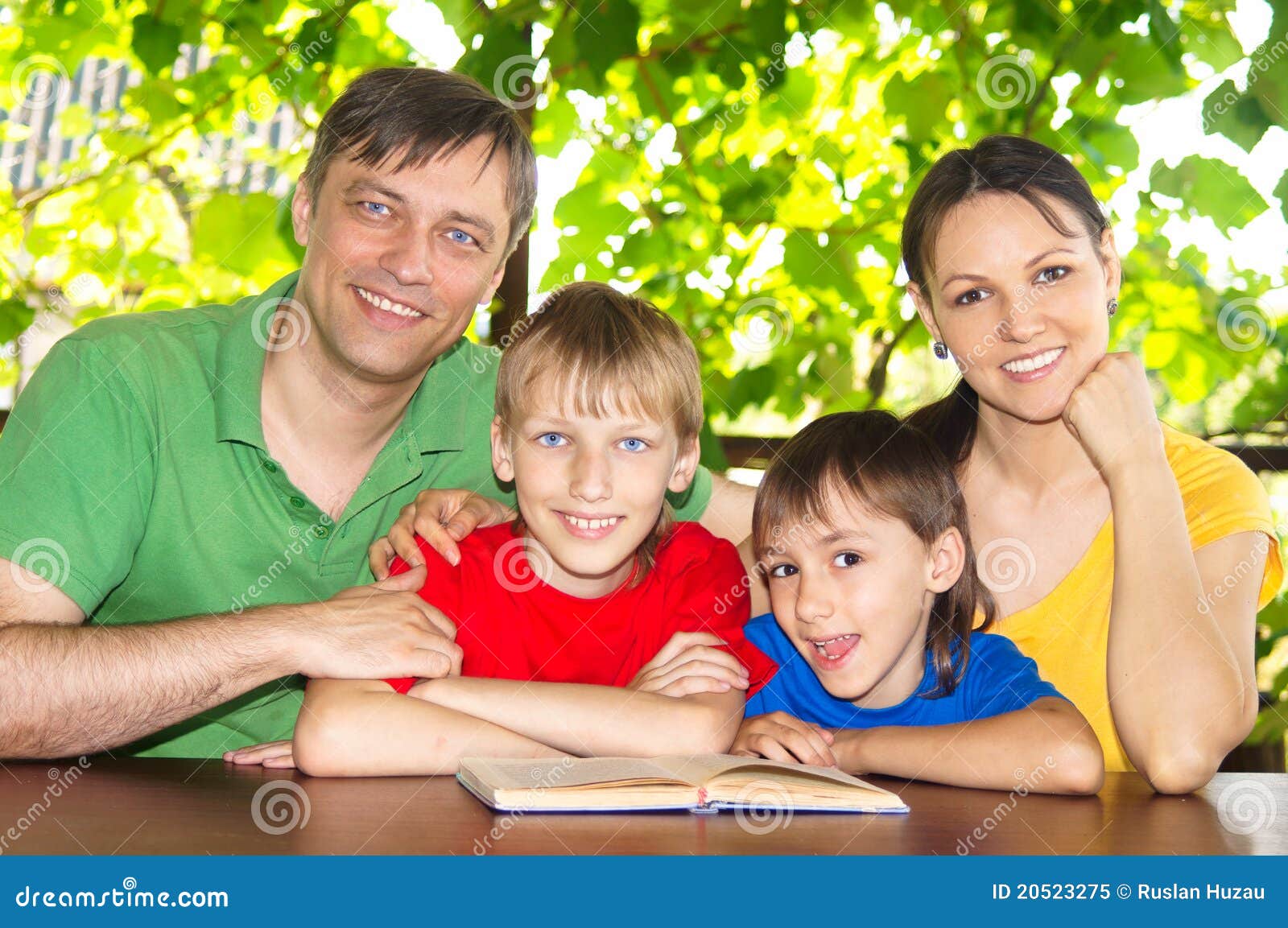 Beautiful family reading stock image. Image of happiness - 20523275
