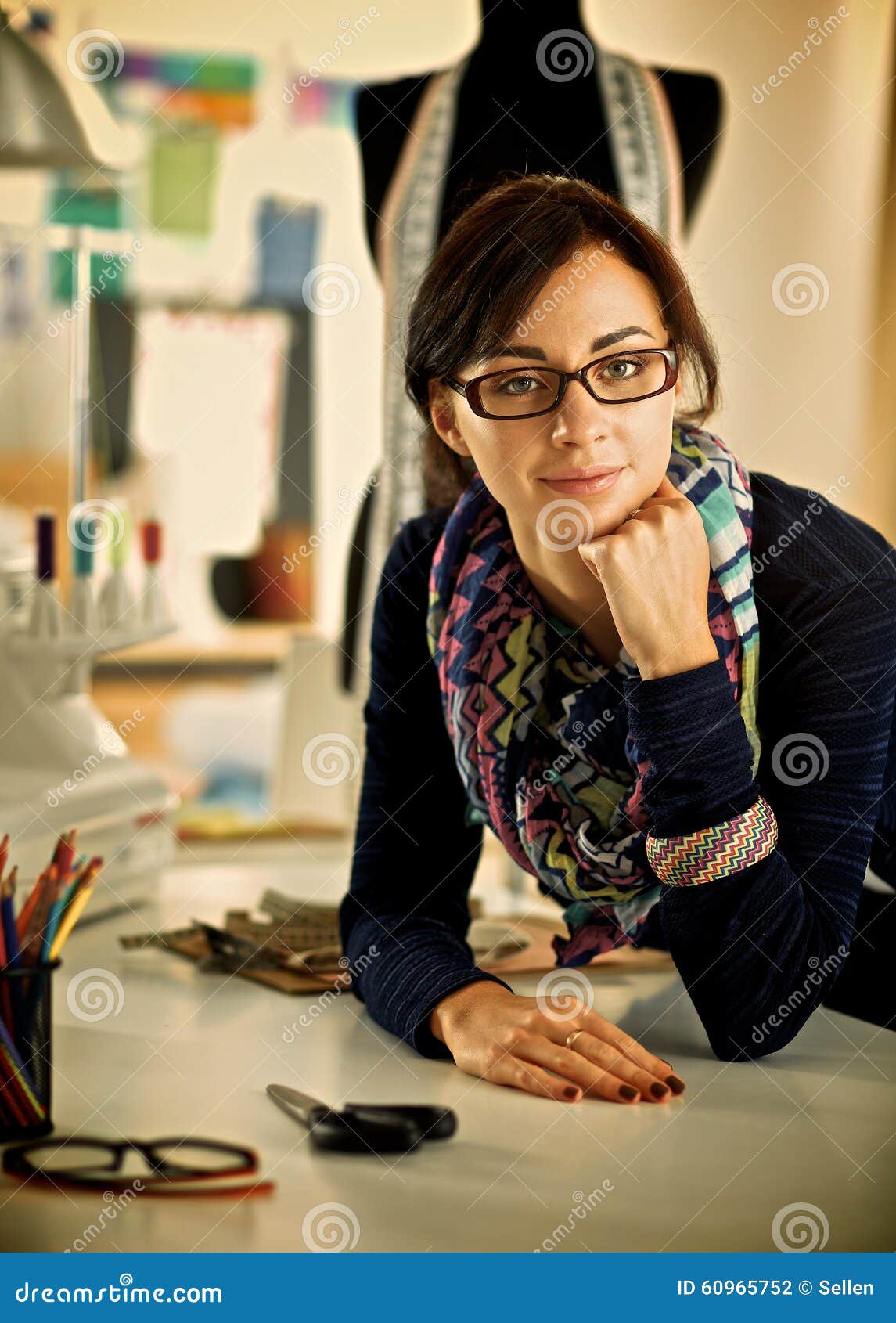 Beautiful Fashion Designer Sitting at the Desk in Stock Photo - Image ...