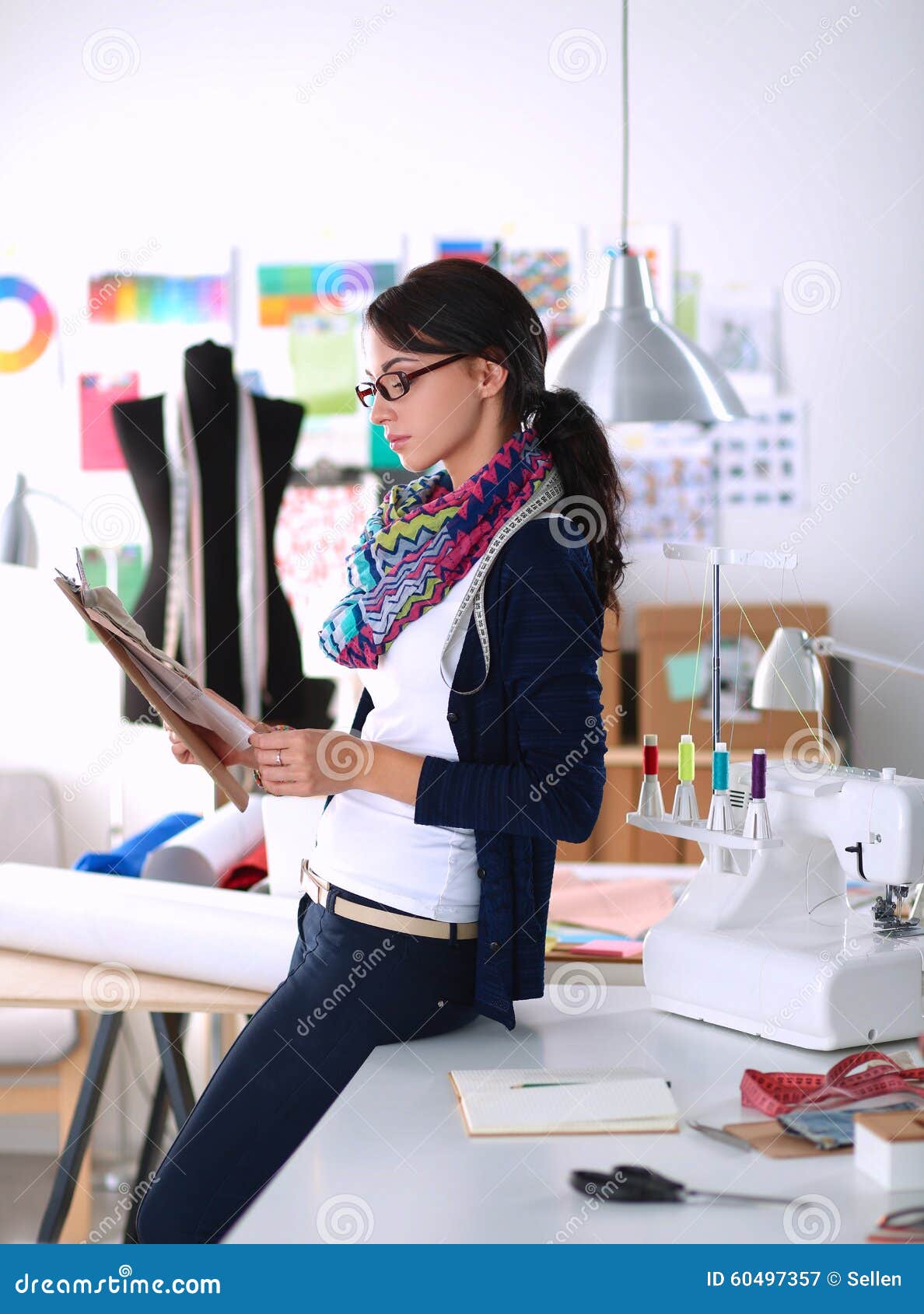 Beautiful Fashion Designer Standing with Folder in Stock Image - Image ...