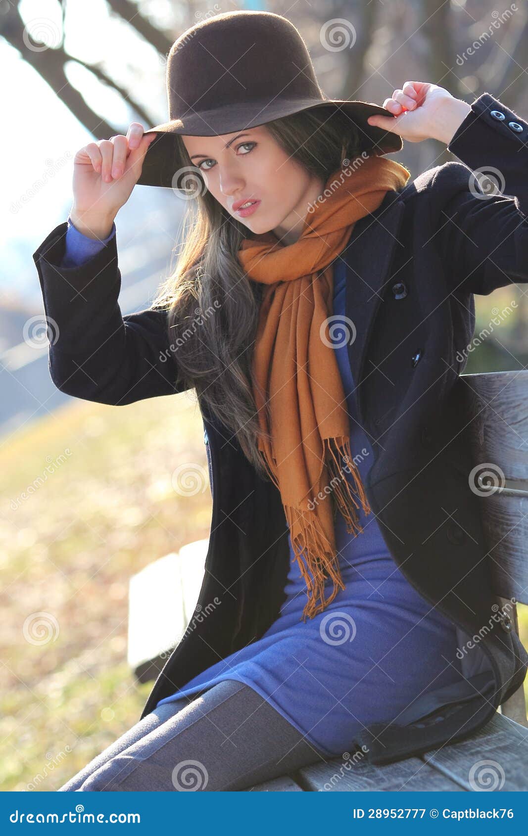 Beautiful Fashion Model Poses on a Bench Stock Image - Image of young ...
