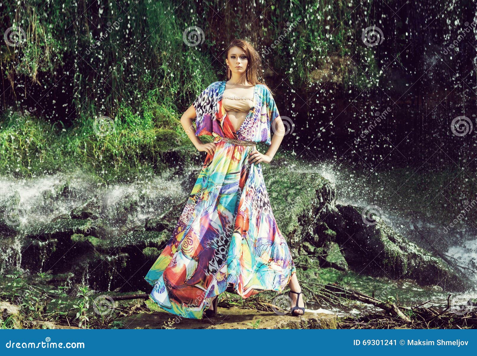 Beautiful Fashion Model Posing in Front of a Waterfall Stock Image ...