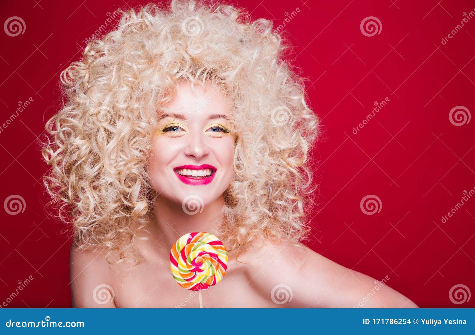 Beautiful Fashionable Blonde Girl In Retro Style With Voluminous Curly