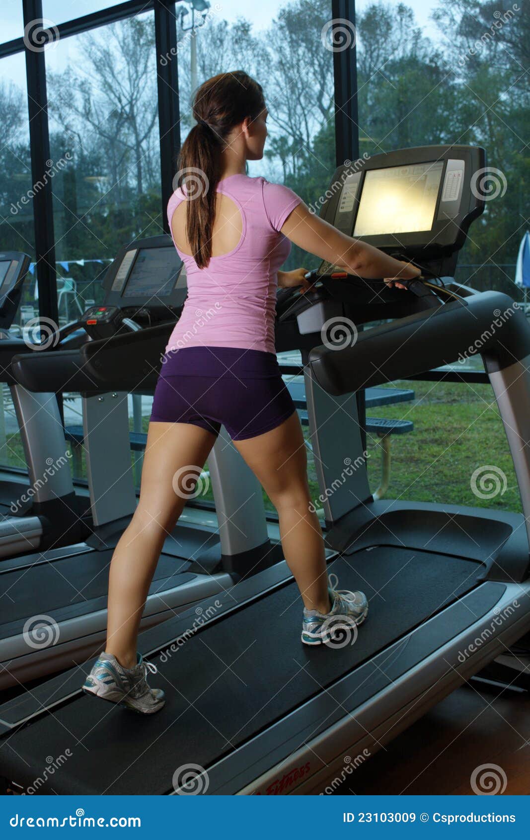 Beautiful Female Athlete on a Treadmill (2) Stock Image - Image of ...