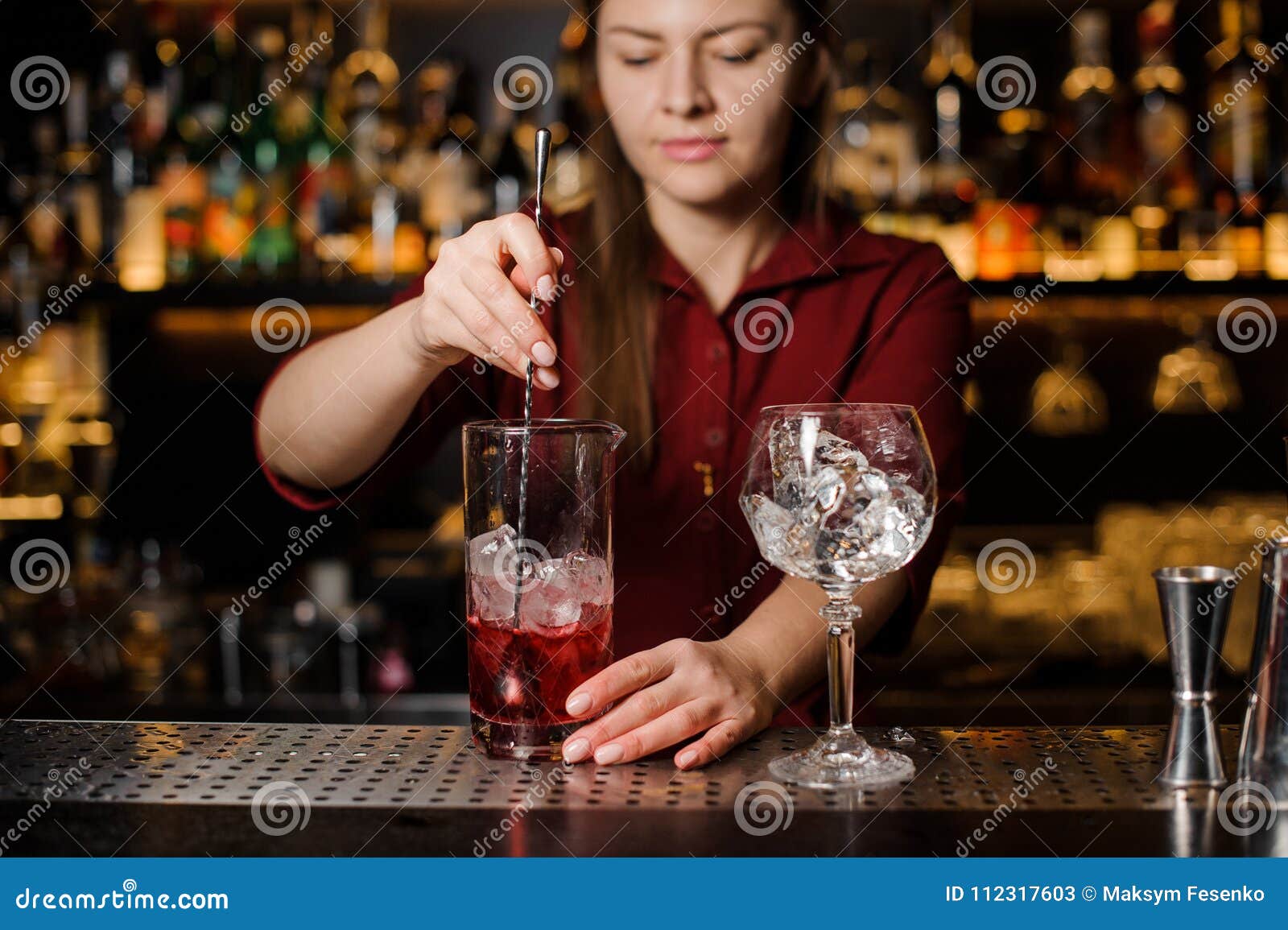 Beautiful Female Barman Stirring Sweet Alcoholic Drink With Ice Stock