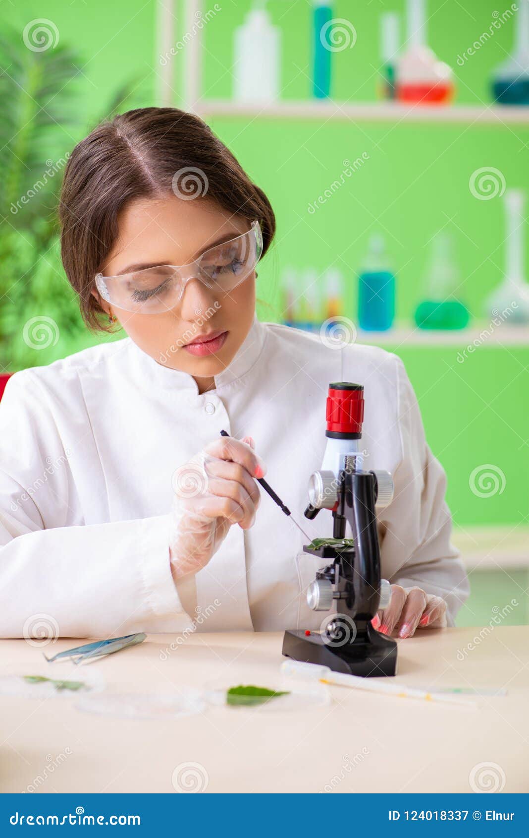 The Beautiful Female Biotechnology Scientist Chemist Working in Lab ...