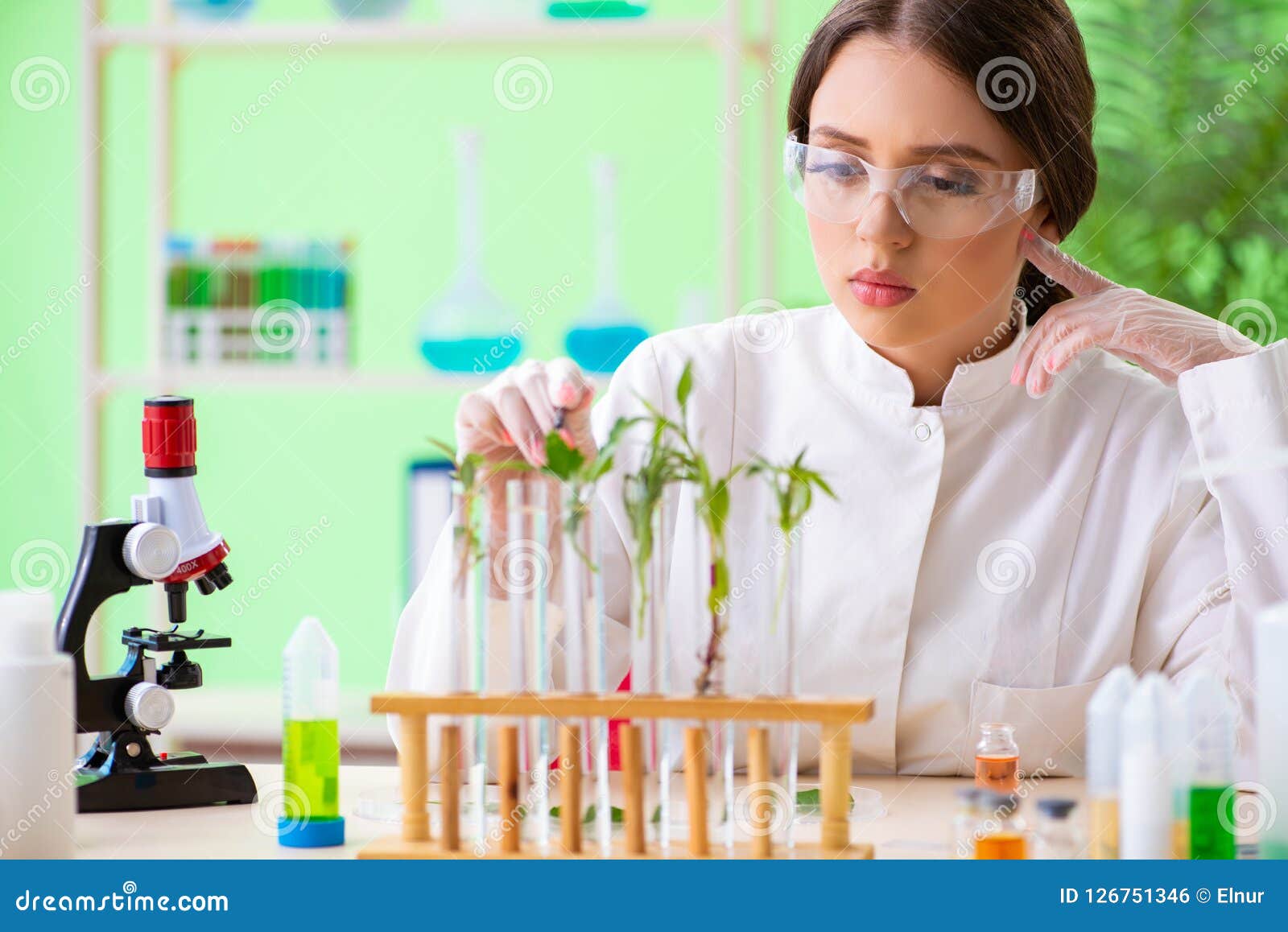 The Beautiful Female Biotechnology Scientist Chemist Working in Lab ...