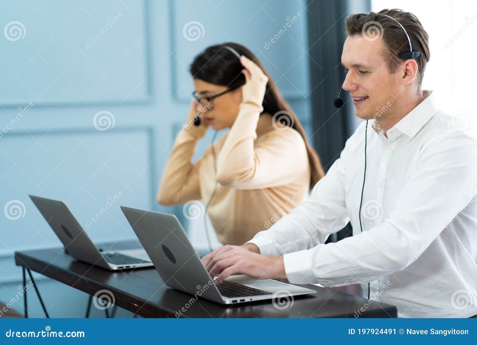 Beautiful Female Call Center Operator Working on Computer in Office ...
