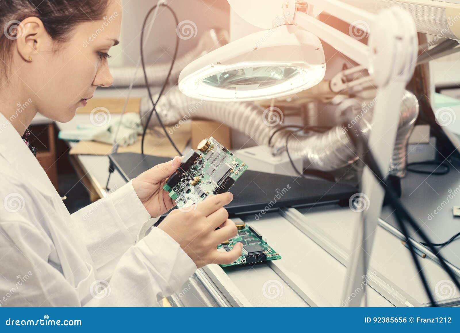 Beautiful Female Computer Expert Professional Technician Examining ...