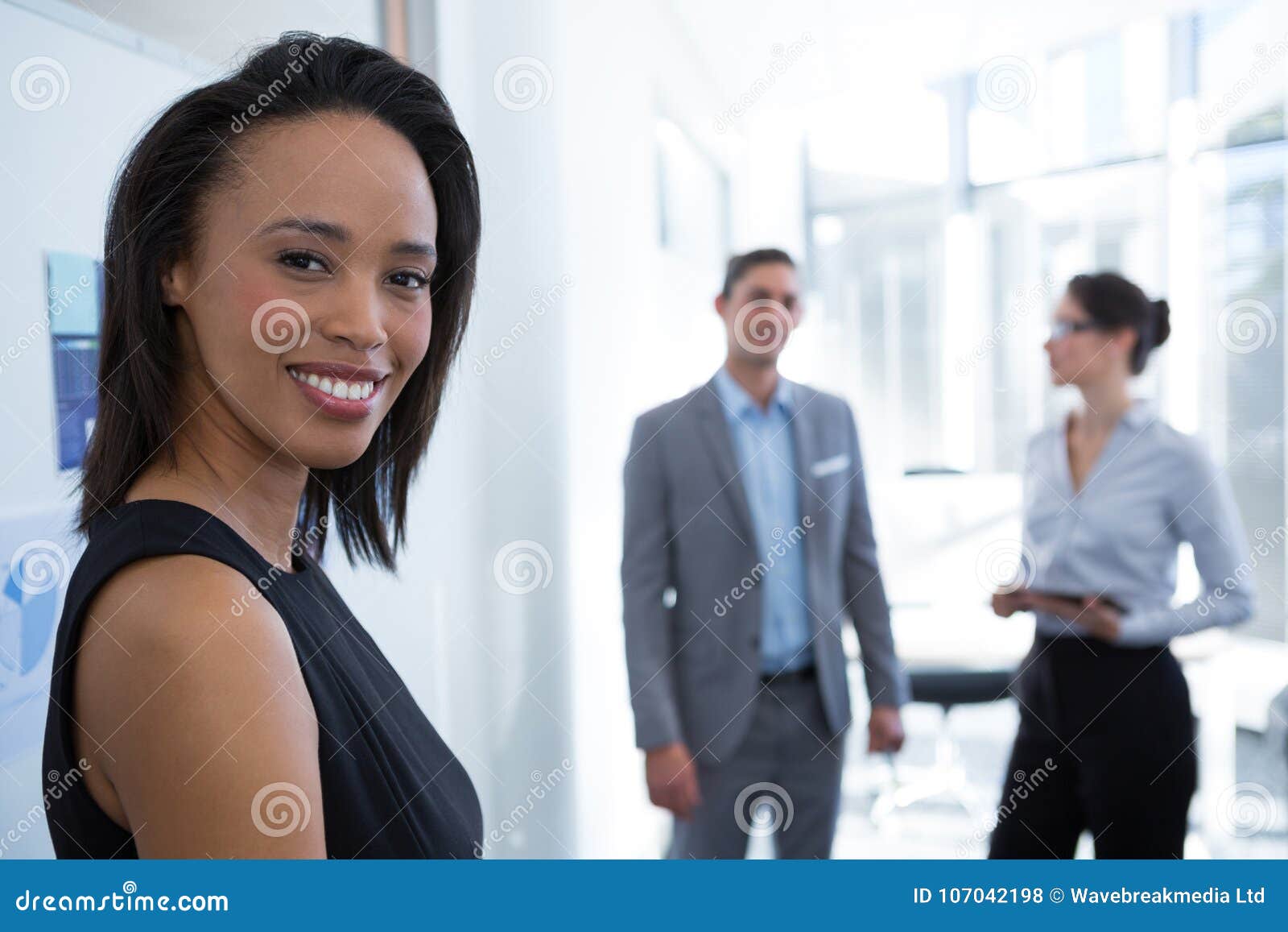 Beautiful Female Executive Looking at Camera Stock Photo - Image of ...