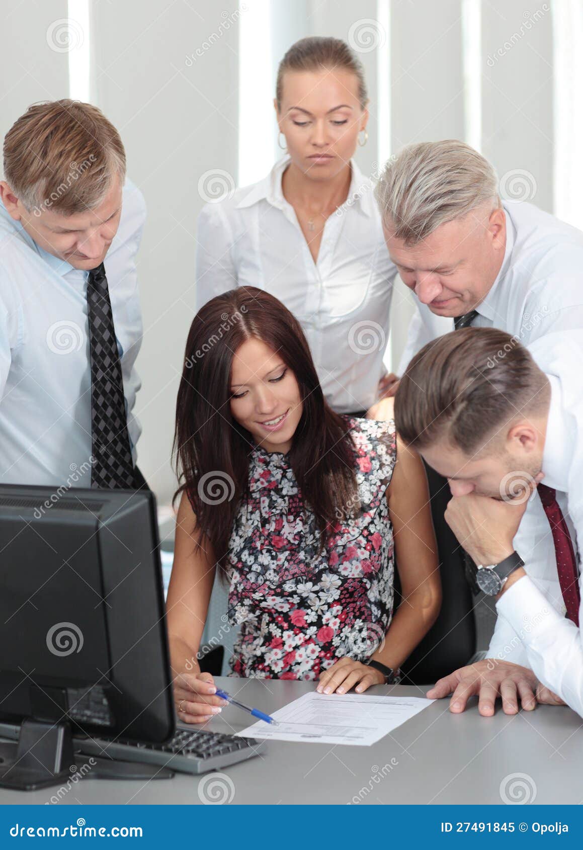 Beautiful Female Executive Pointing at Laptop Scre Stock Image - Image ...