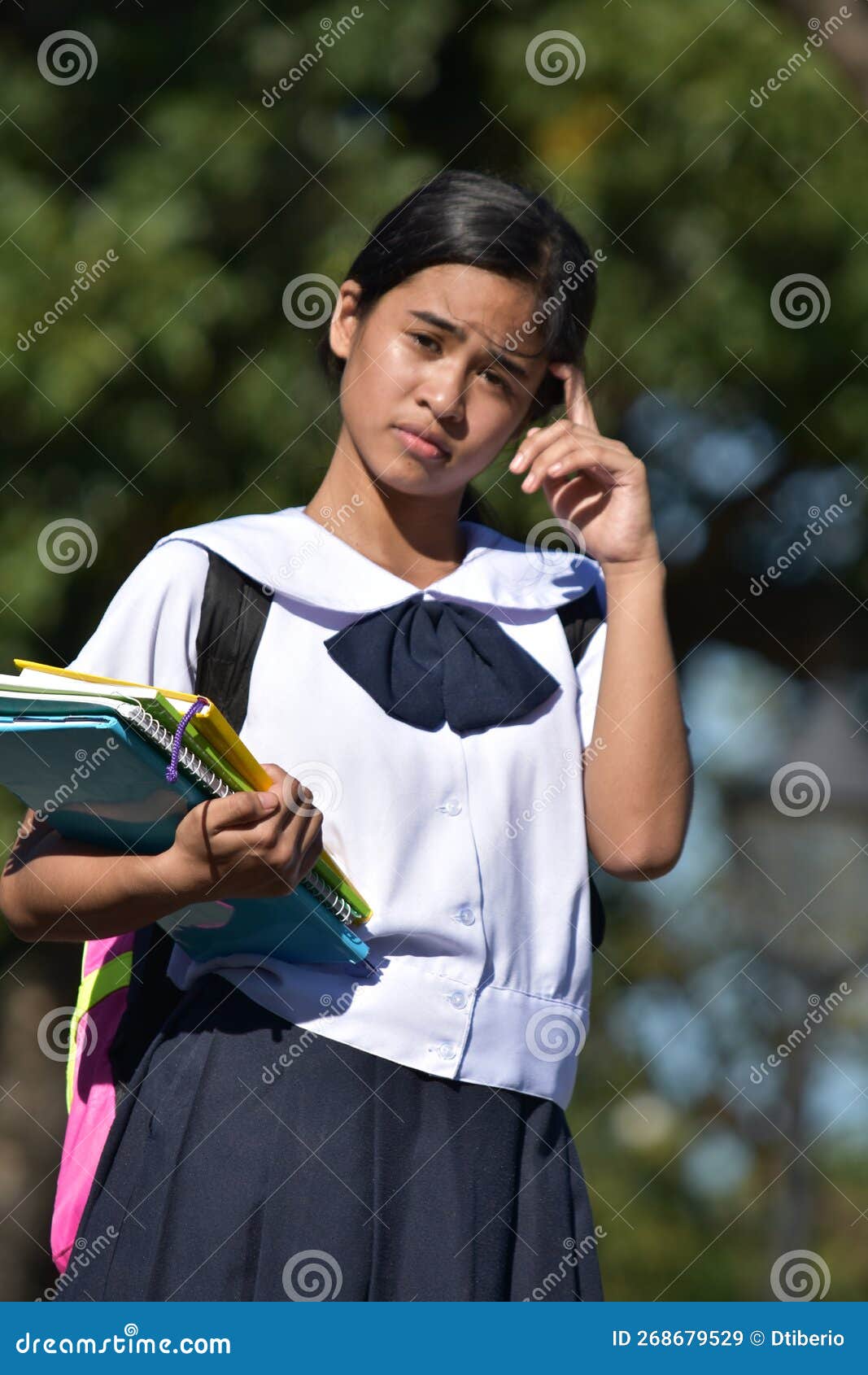 Beautiful Female Student and Confusion with Textbooks Stock Image ...