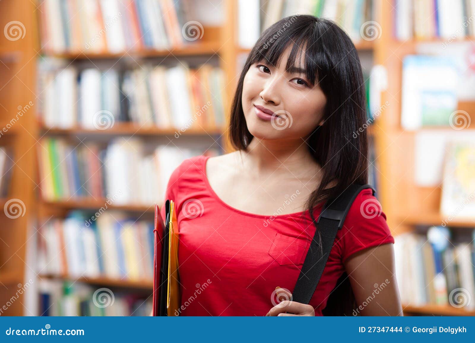 Beautiful Female Student in a Library Stock Photo - Image of college ...